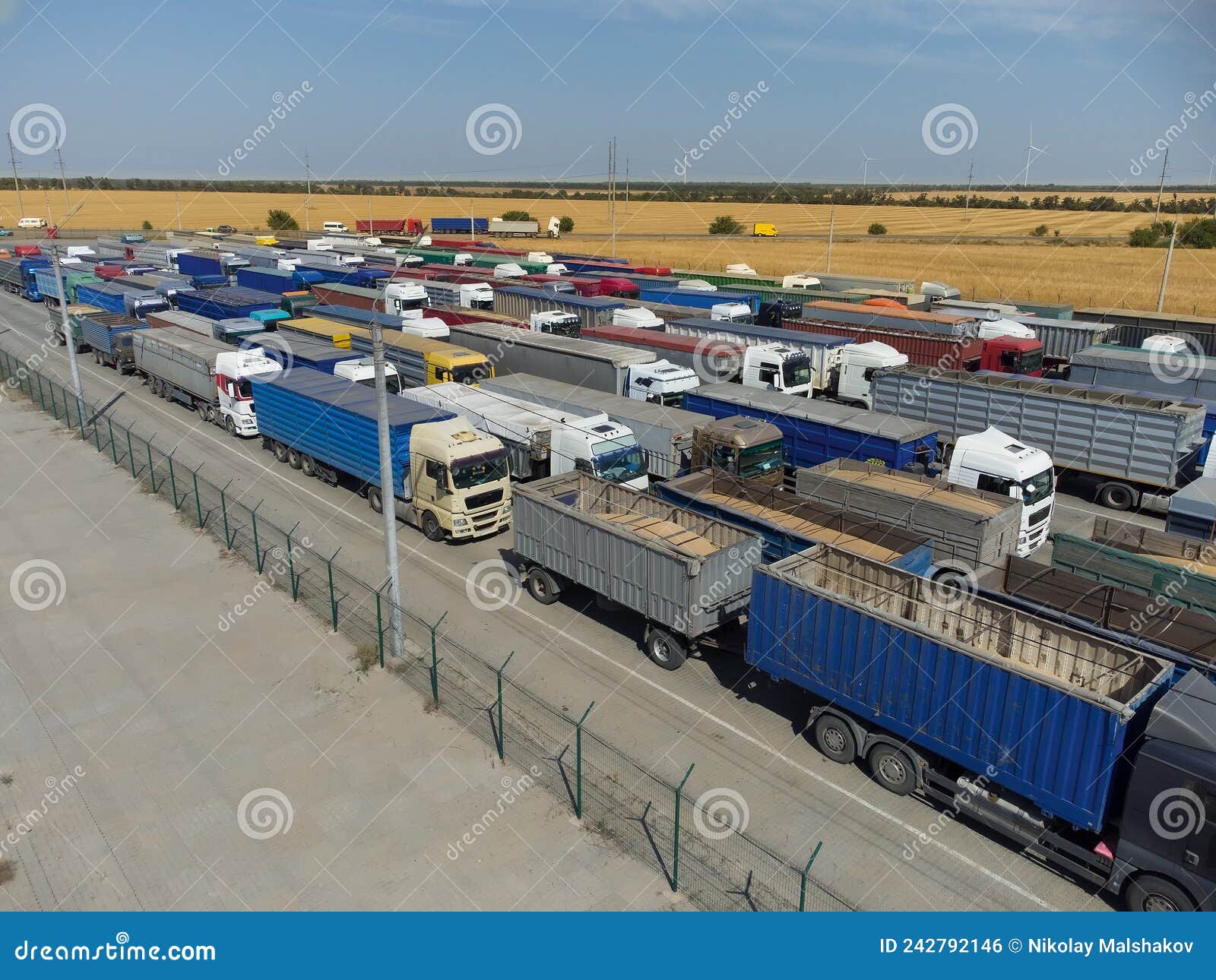 Lots of Trucks with Trailers in the Parking Lot. Queue for Unloading at ...