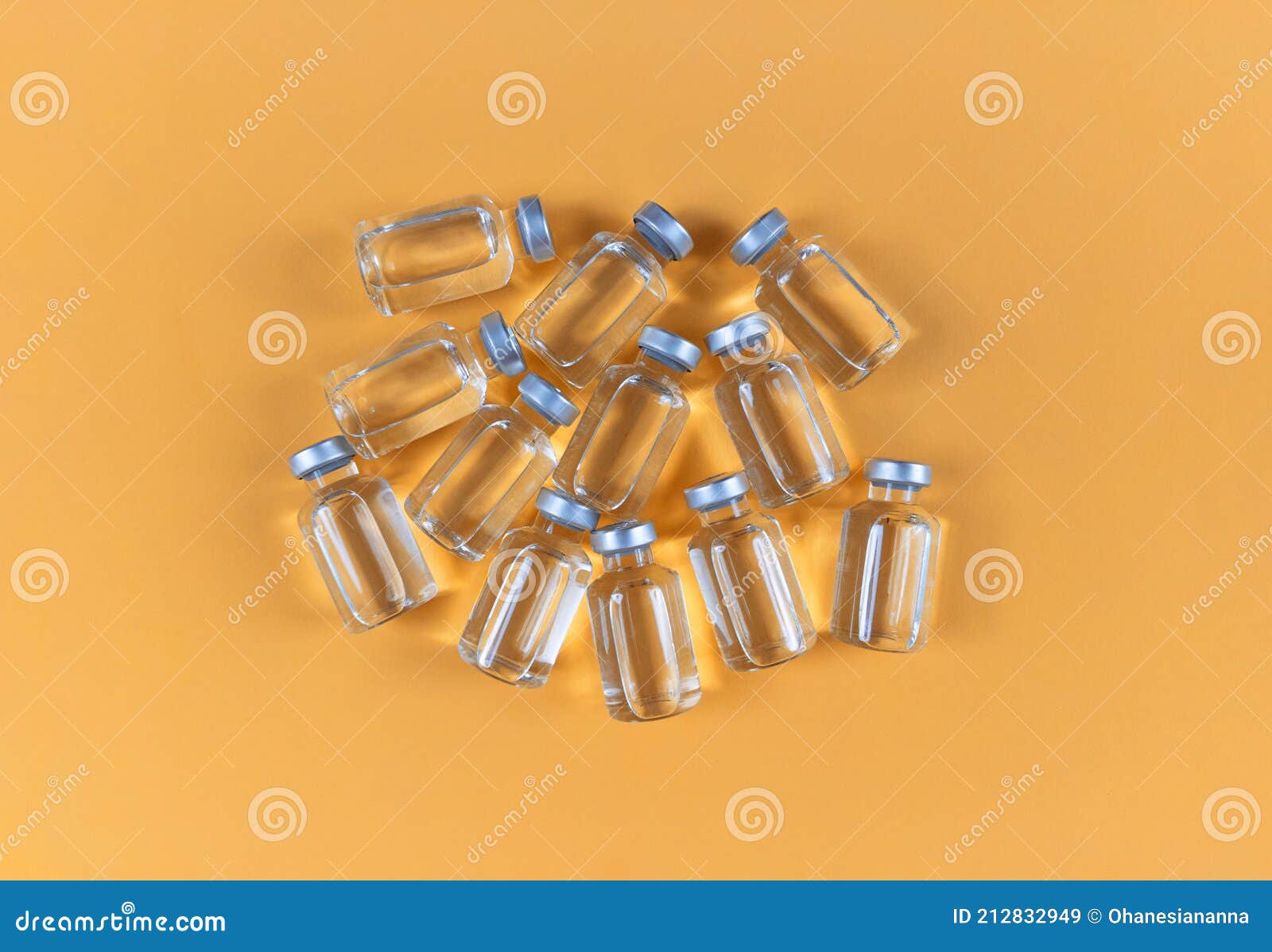 Lots of Vials with Liquid Medicine on Yellow Backdrop Stock Image ...