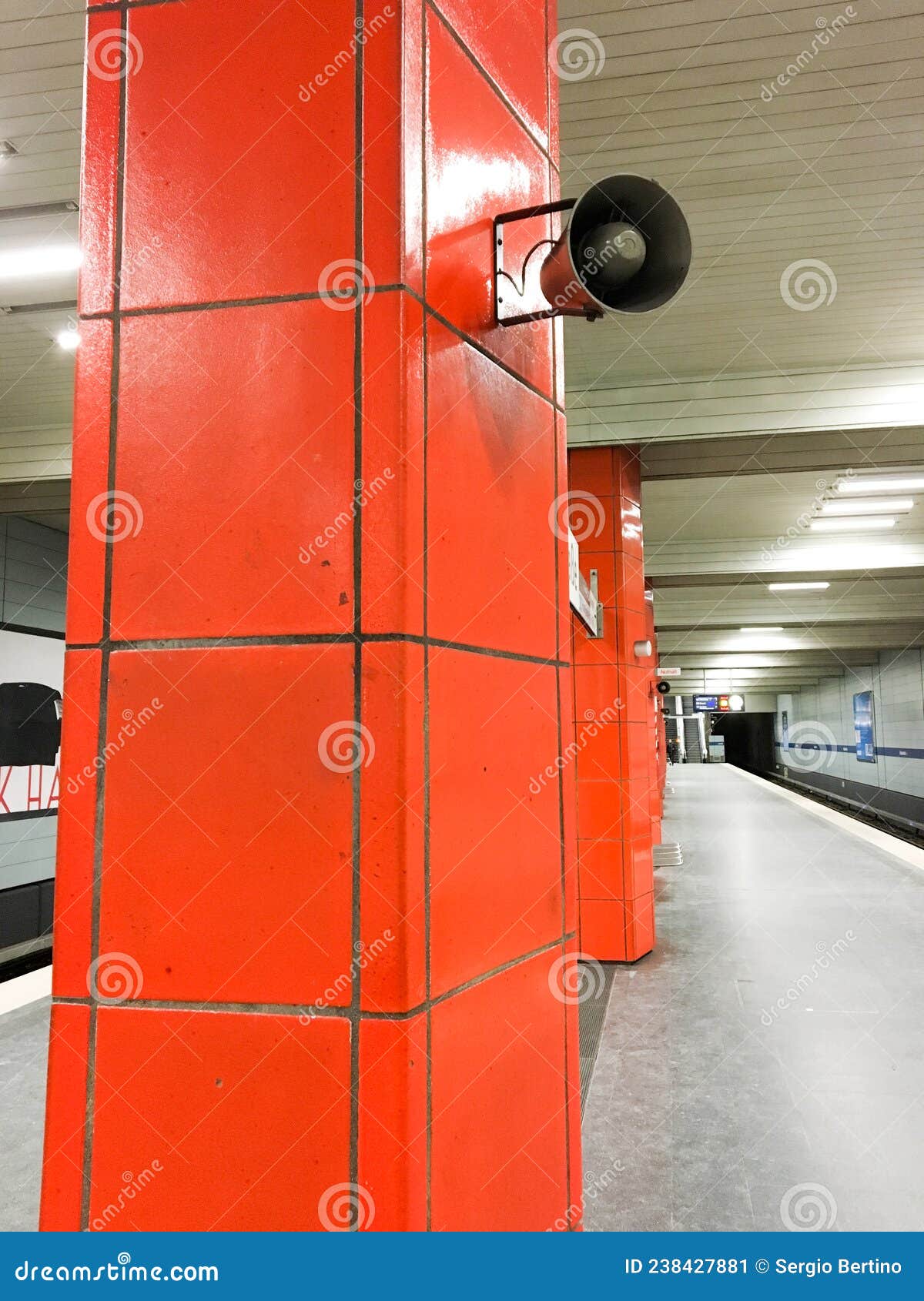 Loud Speaker on a Red Tiled Column Stock Image - Image of urban, tunnel ...
