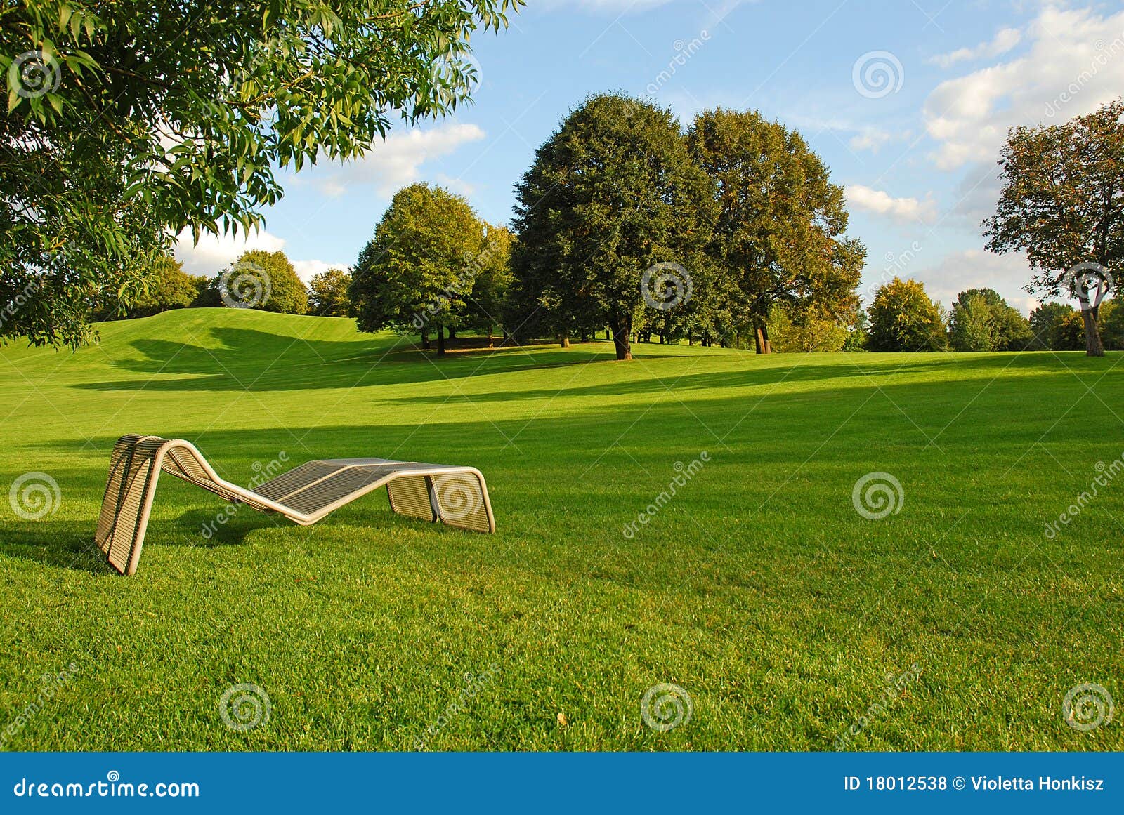 Lounge chair in the park stock photo. Image of landscape - 18012538