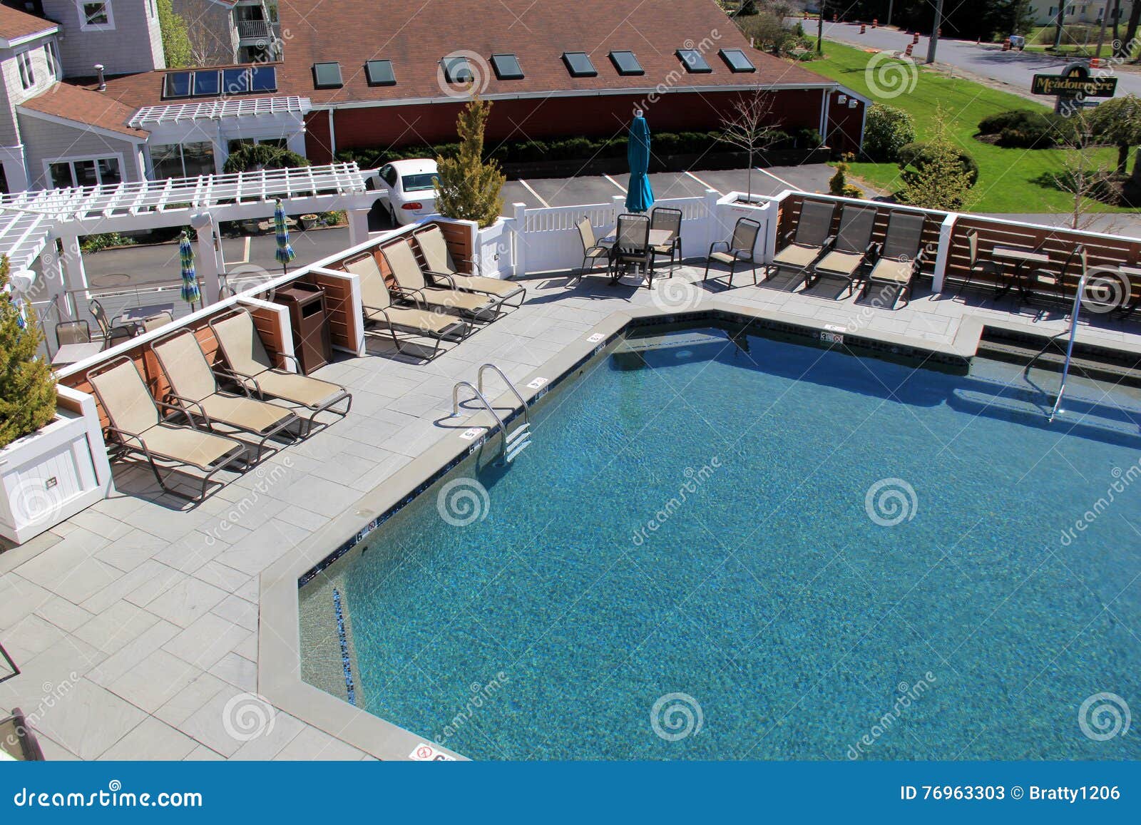 Lounge Chairs Lining the Edges of Welcomng Outdoor Pool, Meadowmere ...