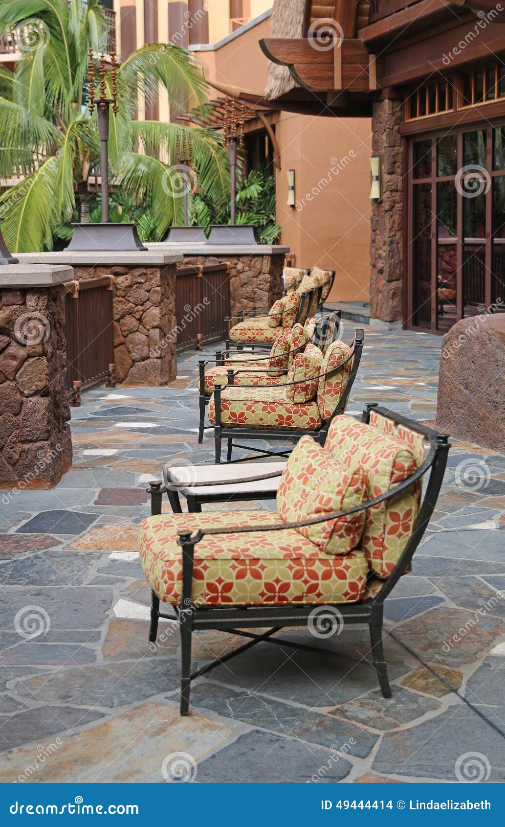 Lounge chairs at resort stock photo. Image of restful - 49444414