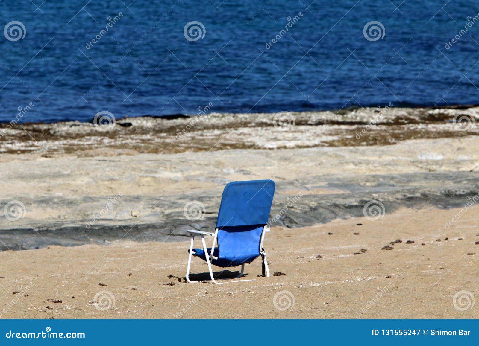 Chairs by the sea stock image. Image of furniture, israel - 131555247