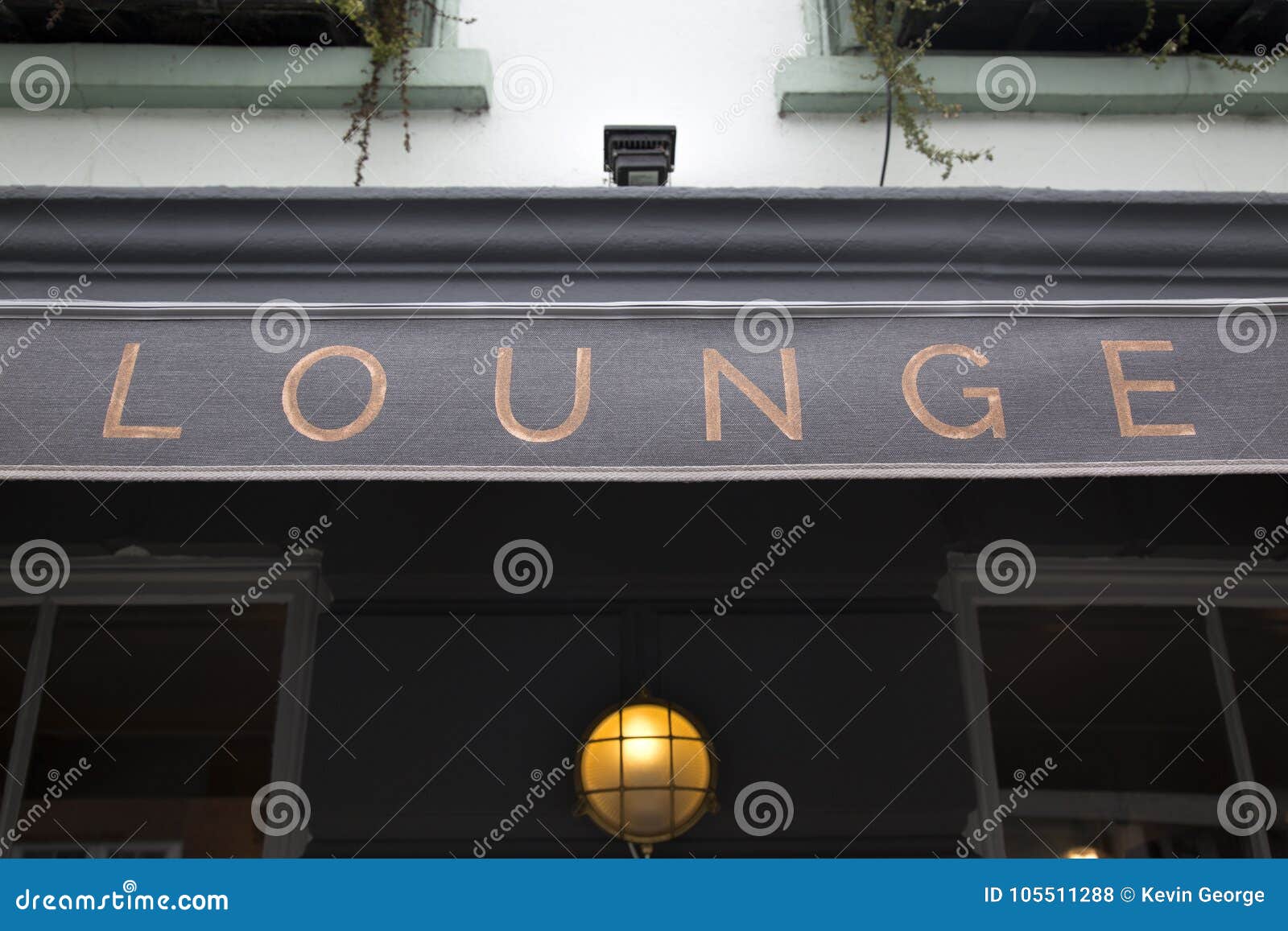 Lounge Sign on Facade editorial stock photo. Image of facade - 105511288