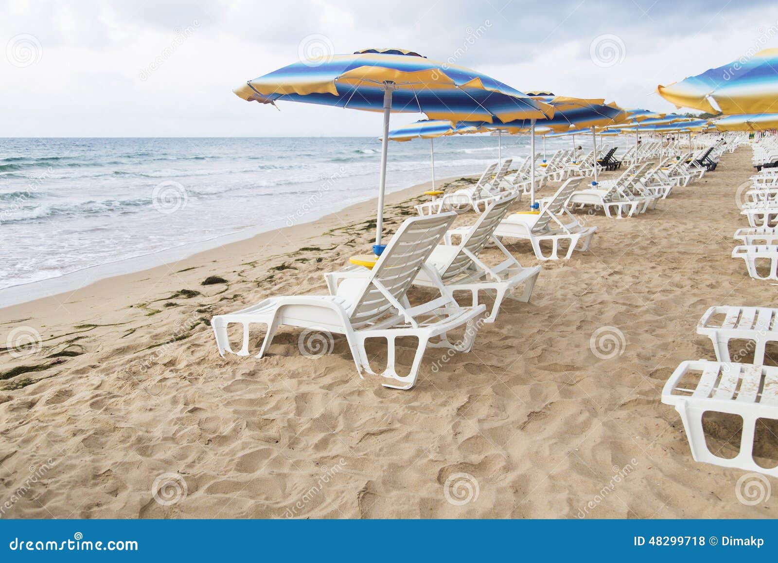 Sun Lounger And Parasol On A Beautiful Sandy Beach. Royalty-Free Stock ...