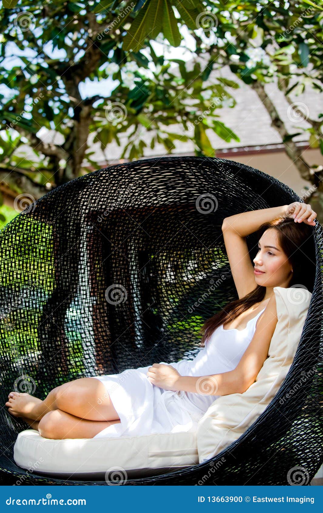 Lounging Outdoors stock photo. Image of sitting, woman - 13663900