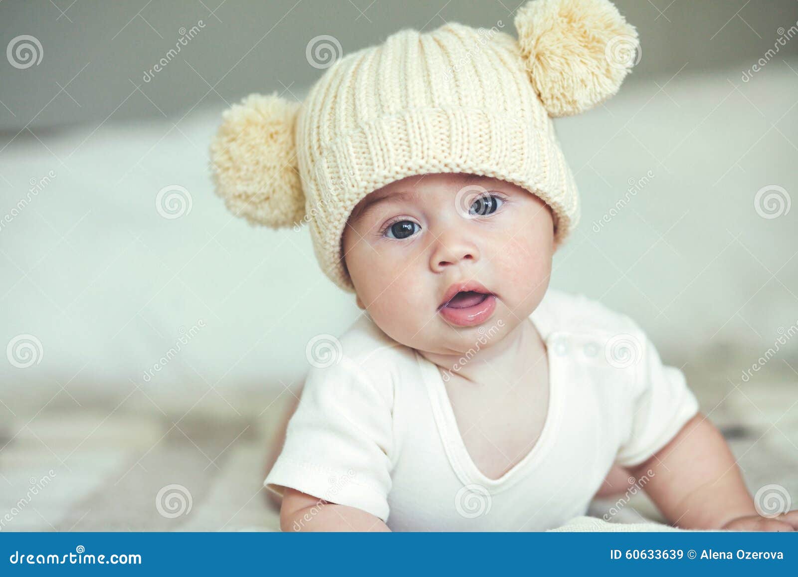 Lovable baby stock image. Image of face, knitted, eyes - 60633639
