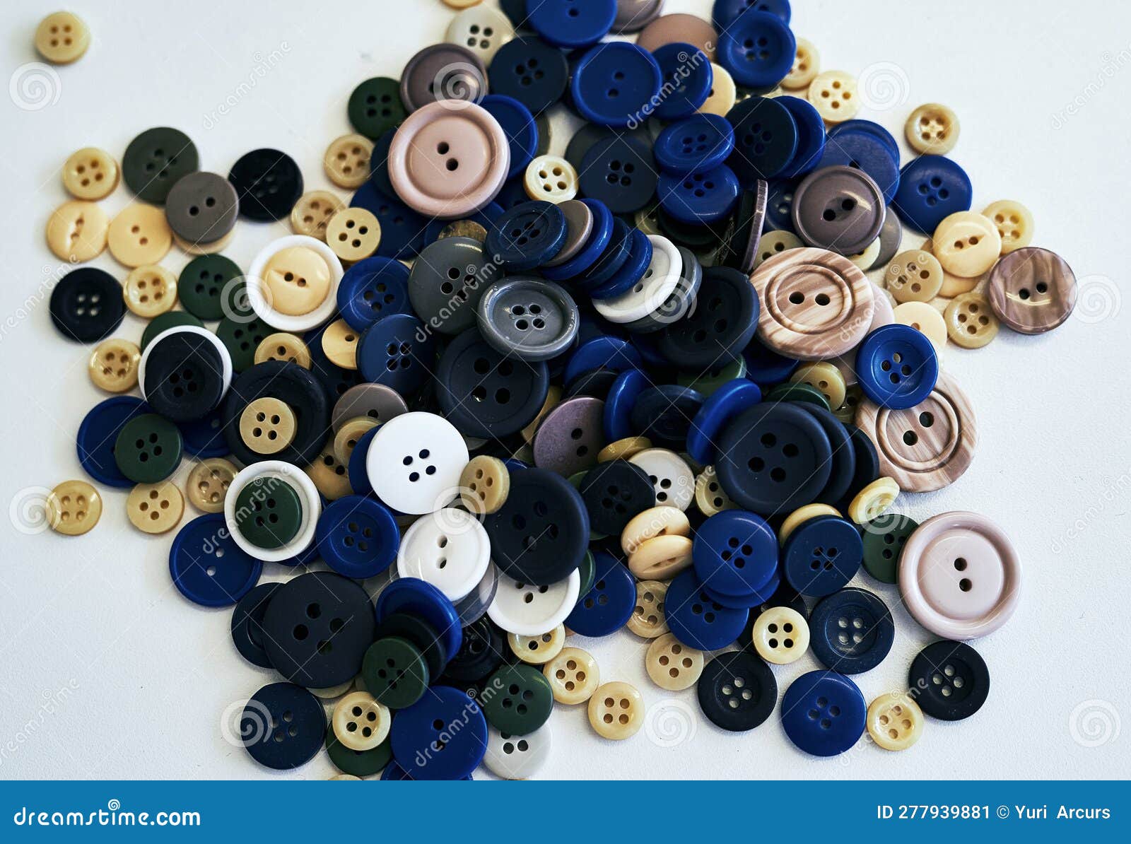 For the Love of Buttons. Sewing Buttons Laying on a White Background ...
