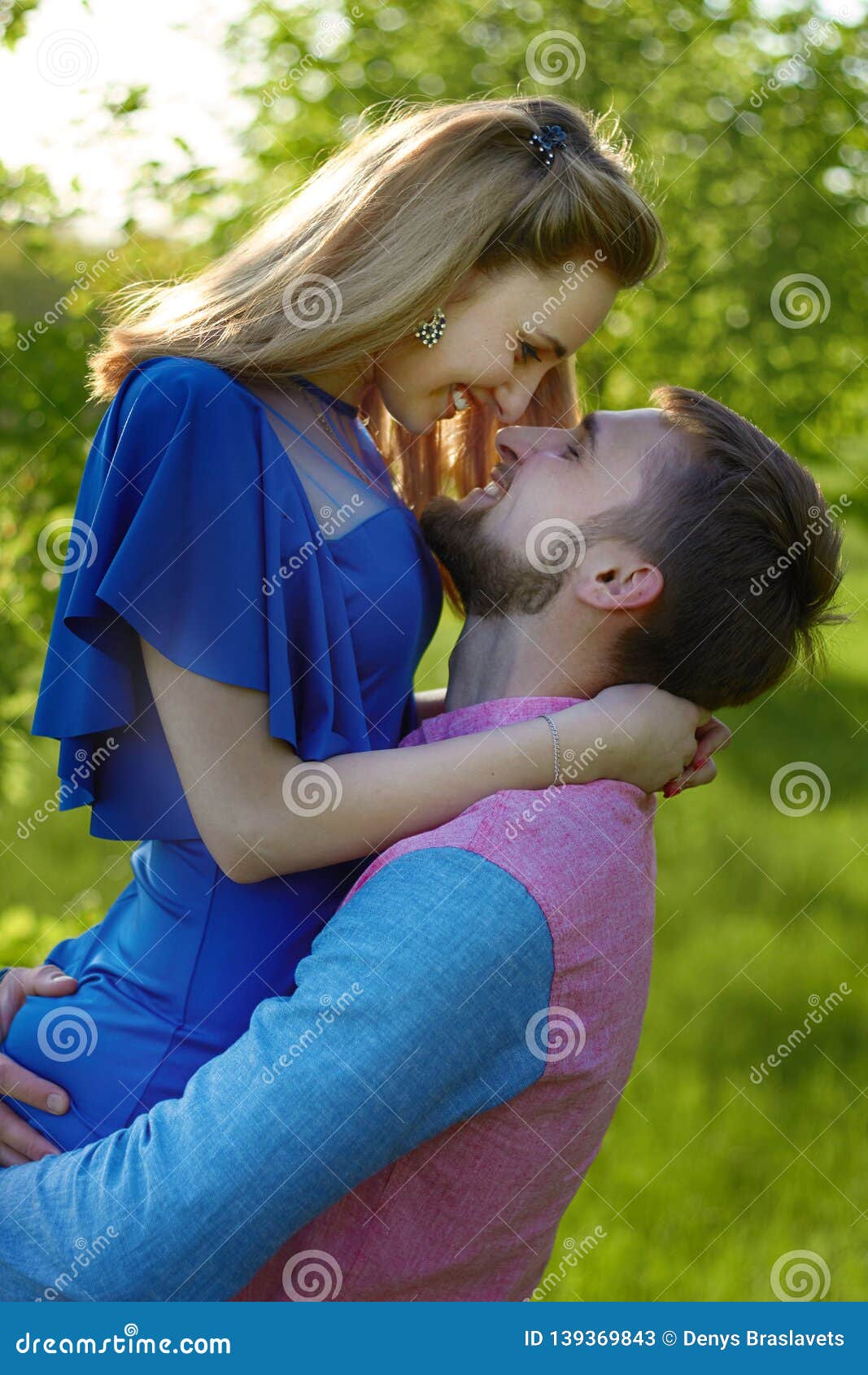 Guy Carrying Girl In Arms Romantic