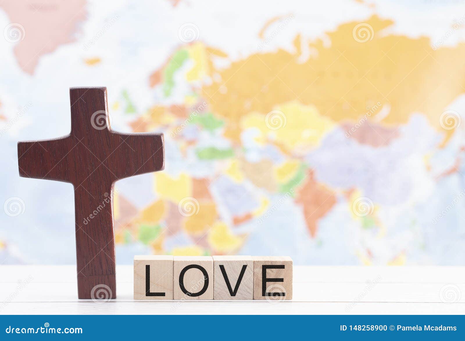Love and the Cross of Christ with the World Map in the Background Stock ...