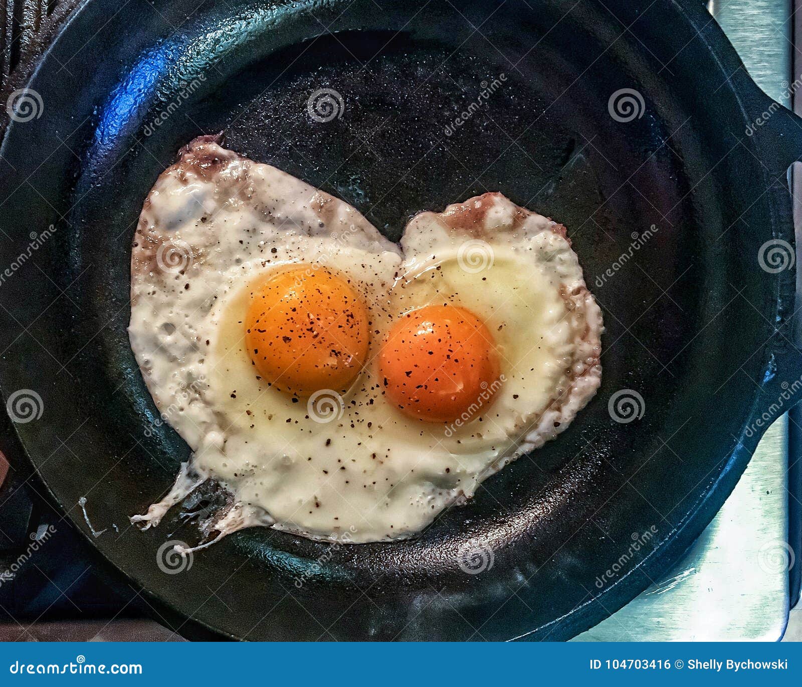 Love Eggs - Heart-shaped Eggs Cooking. Stock Photo - Image of whites ...