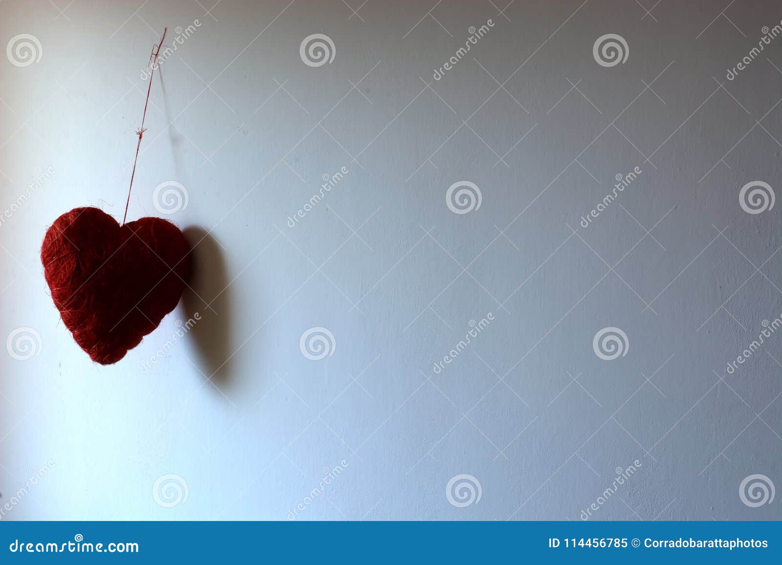 A love hanging by a thread stock image. Image of love - 114456785