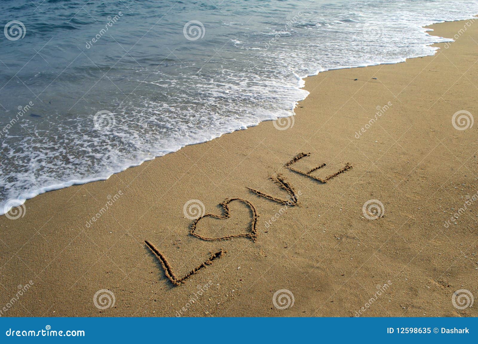 Love in the sand stock image. Image of coastline, holiday - 12598635