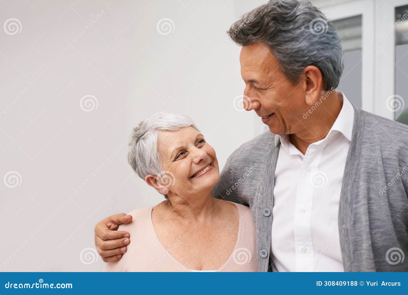 Love Senior Or Couple Hug To Relax In Home Living Room For Bonding