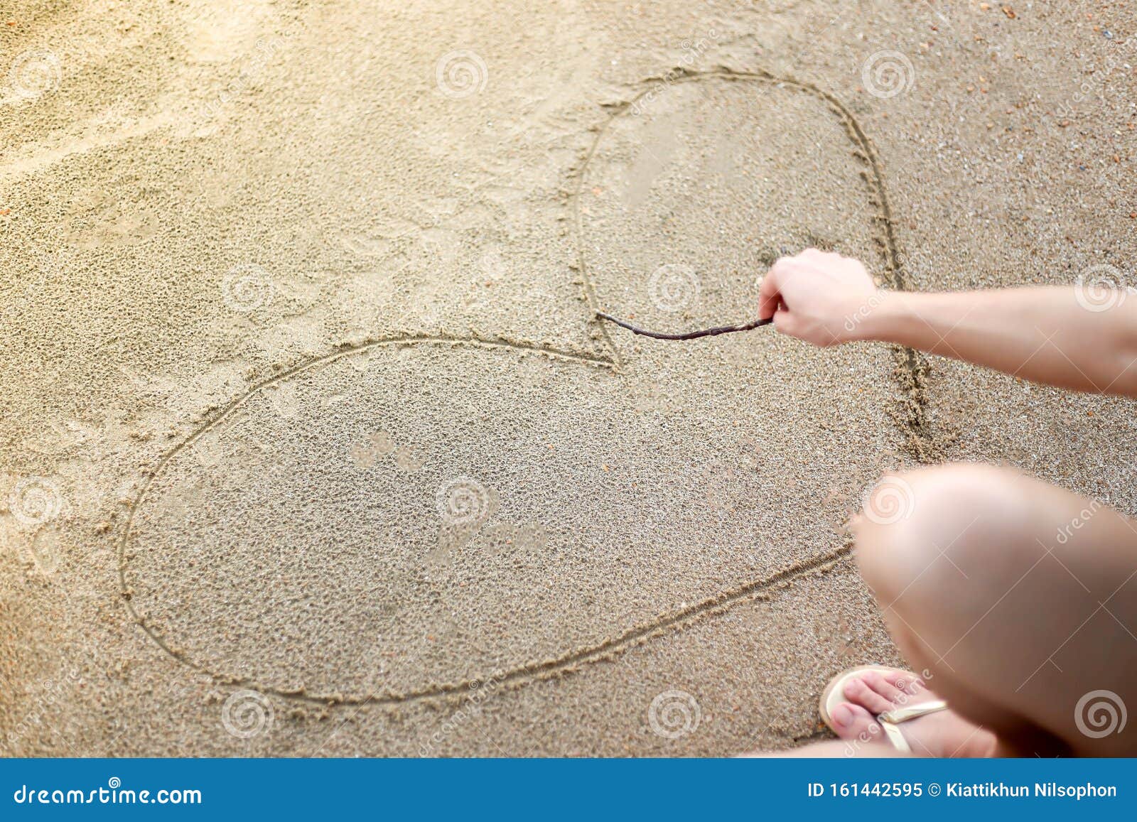 Love Sign Writing on Sand at the Sunset Time on the Beach Stock Image ...