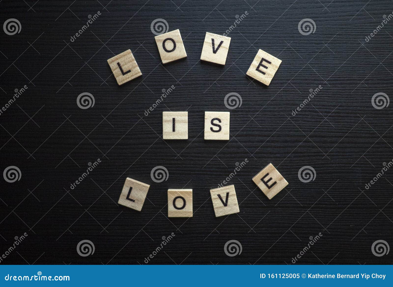Love is Love Word Tiles on a Black Background Stock Image - Image of ...