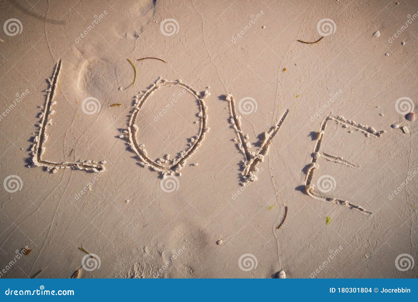 Love written on beach sand stock photo. Image of marry - 180301804