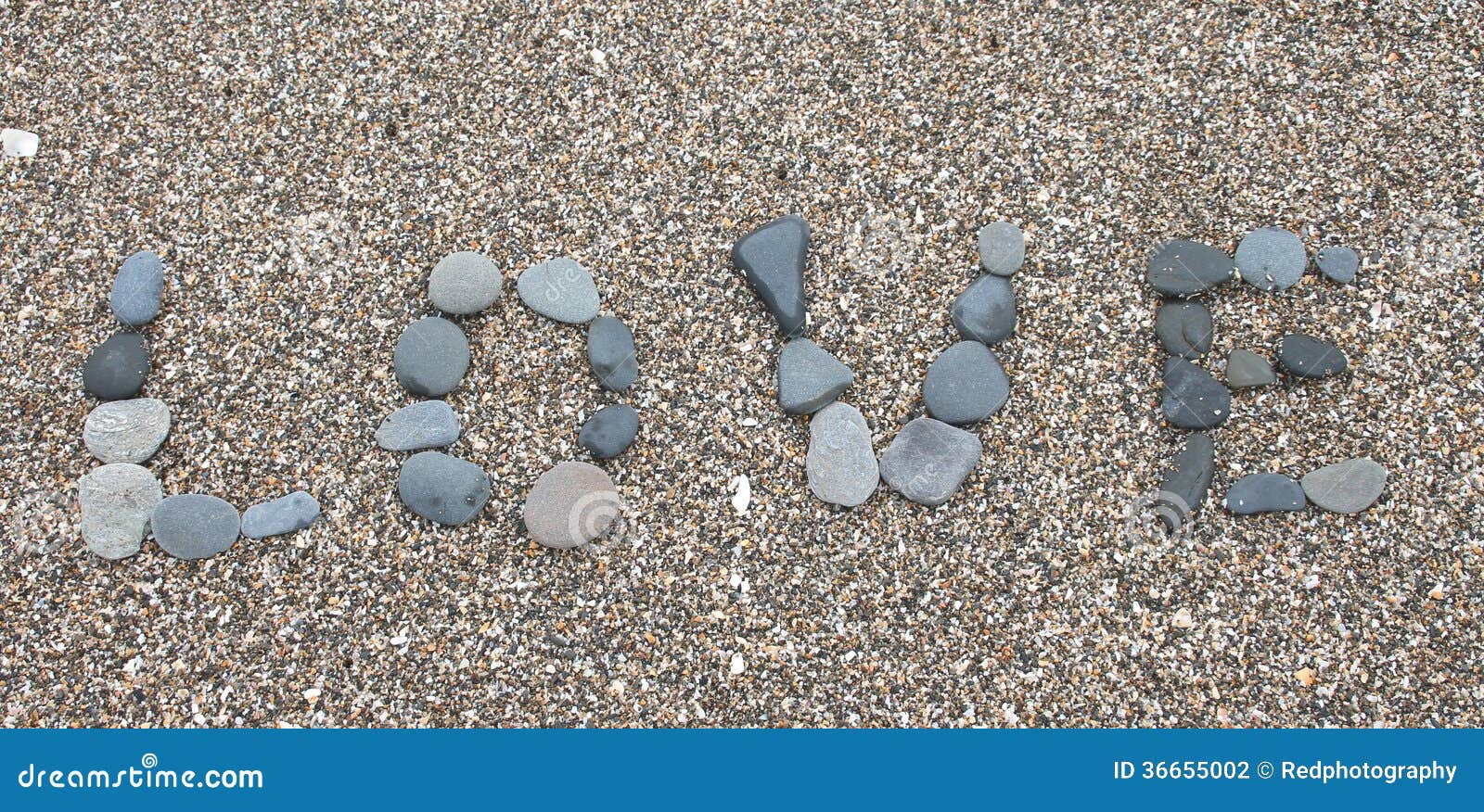 Love Written in Pebbles on a Beach Stock Photo - Image of pebbles ...