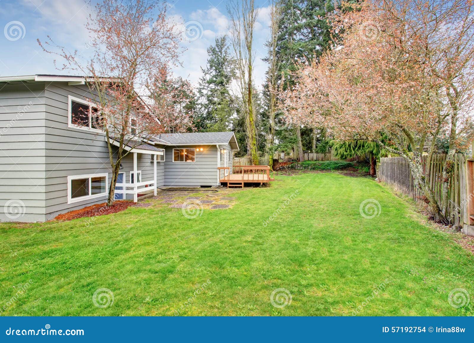 Lovely Back Yard with Deck and Grass. Stock Photo - Image of view ...