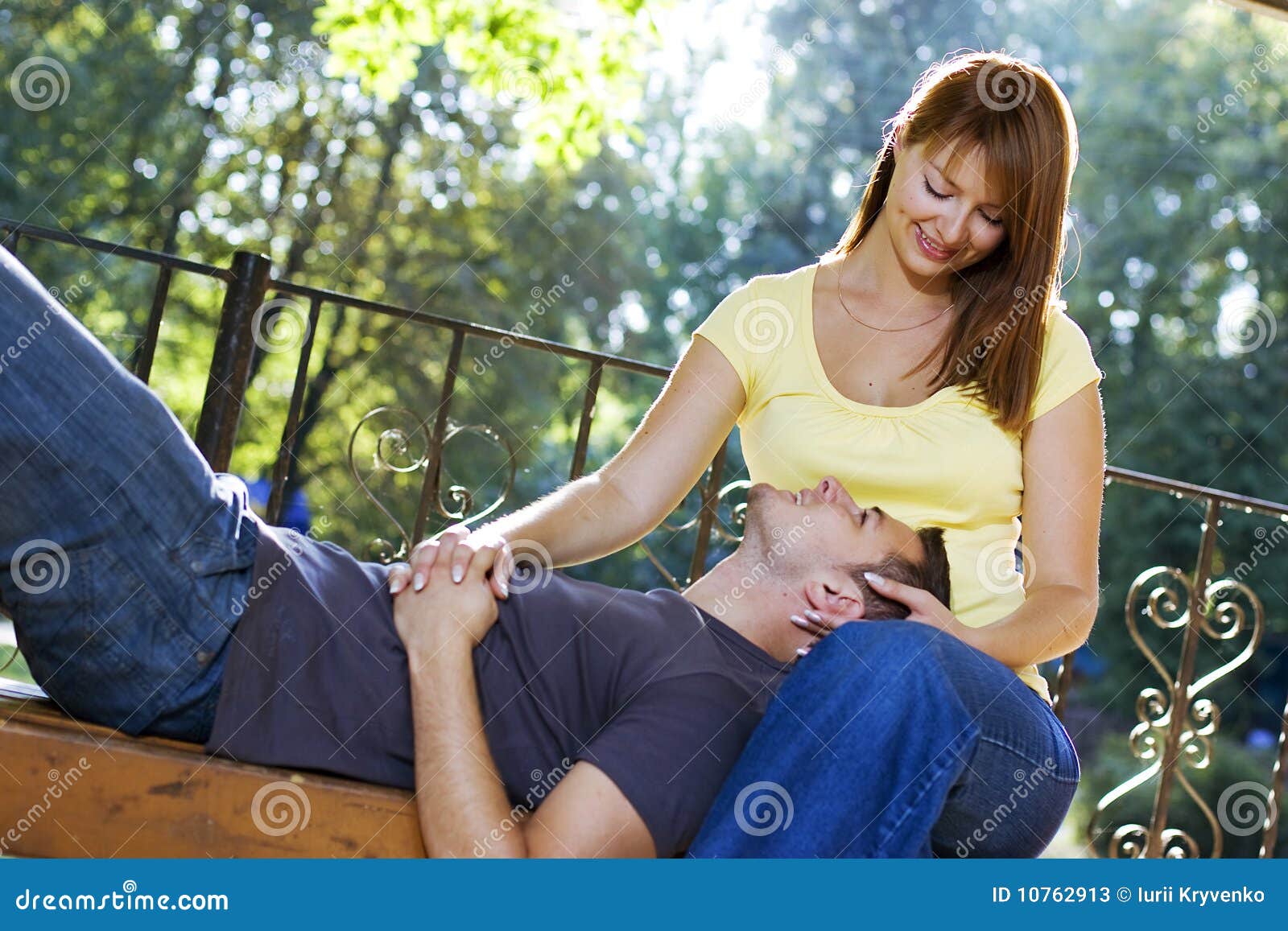 Lovely couple on the bench stock image. Image of smiling - 10762913
