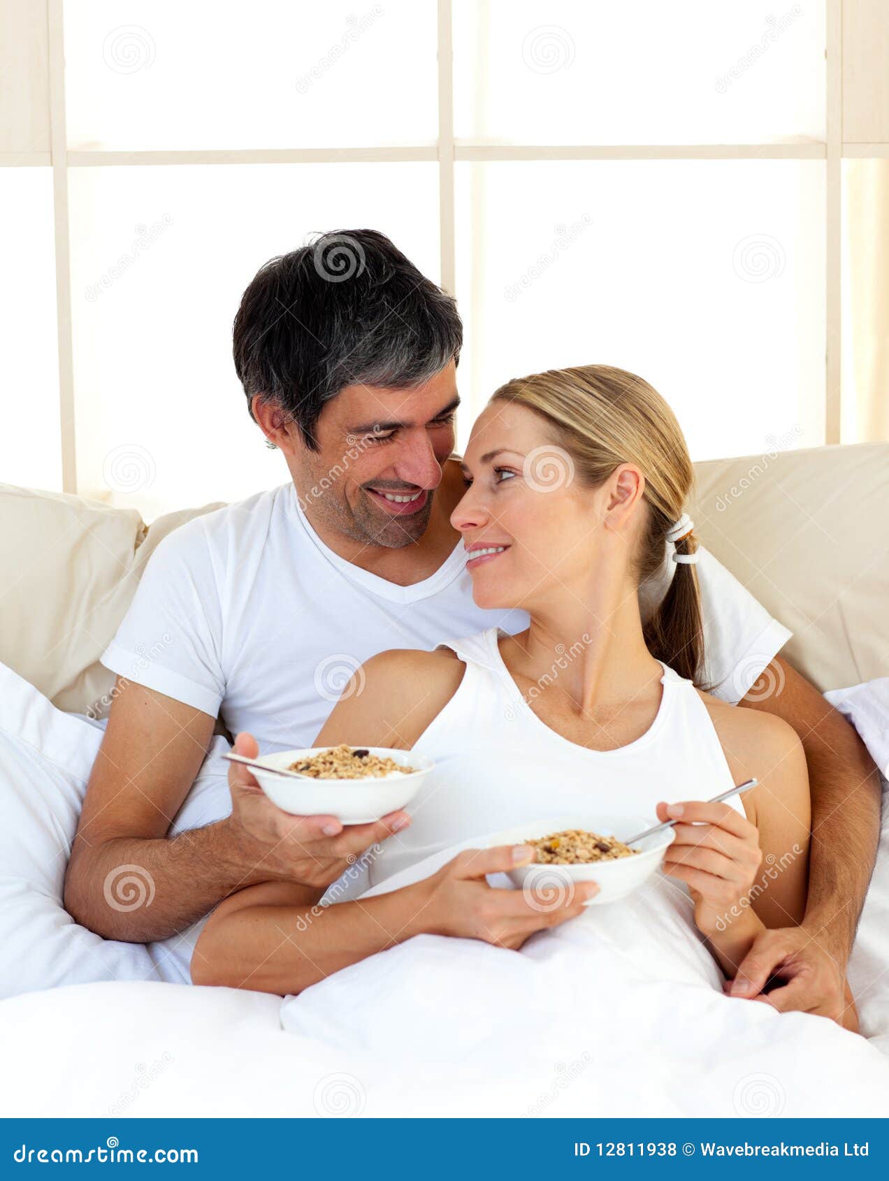 Lovely Couple Having Breakfast Stock Photo - Image of adult, cereal ...