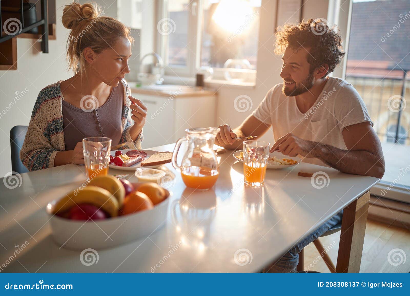 Lovely Couple Having Breakfast Together Stock Image - Image of juice ...
