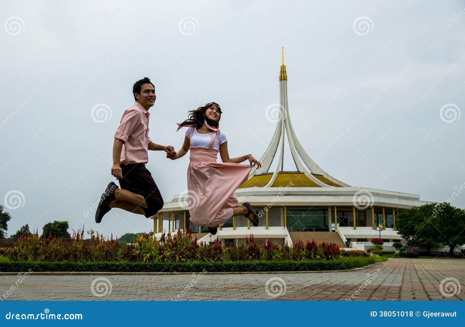 Lovely Couple Jump Up Together2 Stock Photo - Image of kidding, love ...