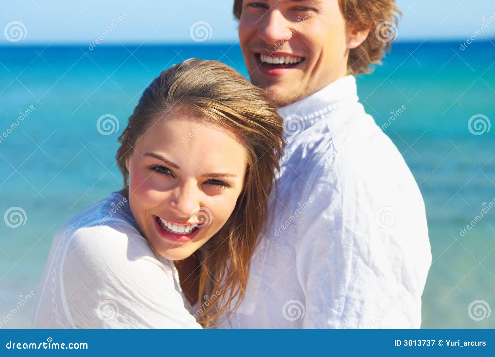 Lovely couple by the sea stock image. Image of attractive - 3013737