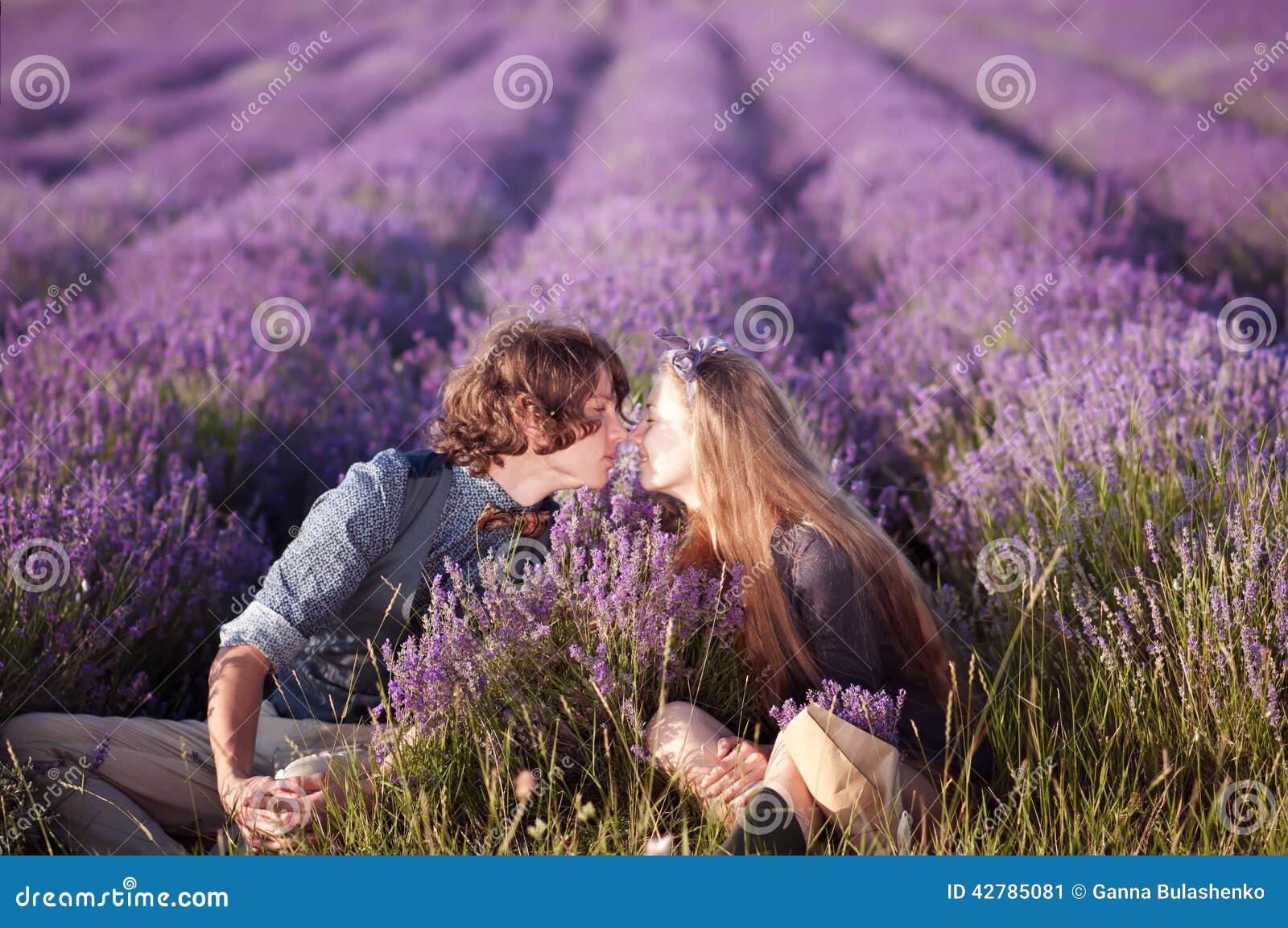 Lovely Couple Sitting in a Lavender Field. Stock Image - Image of mauve ...