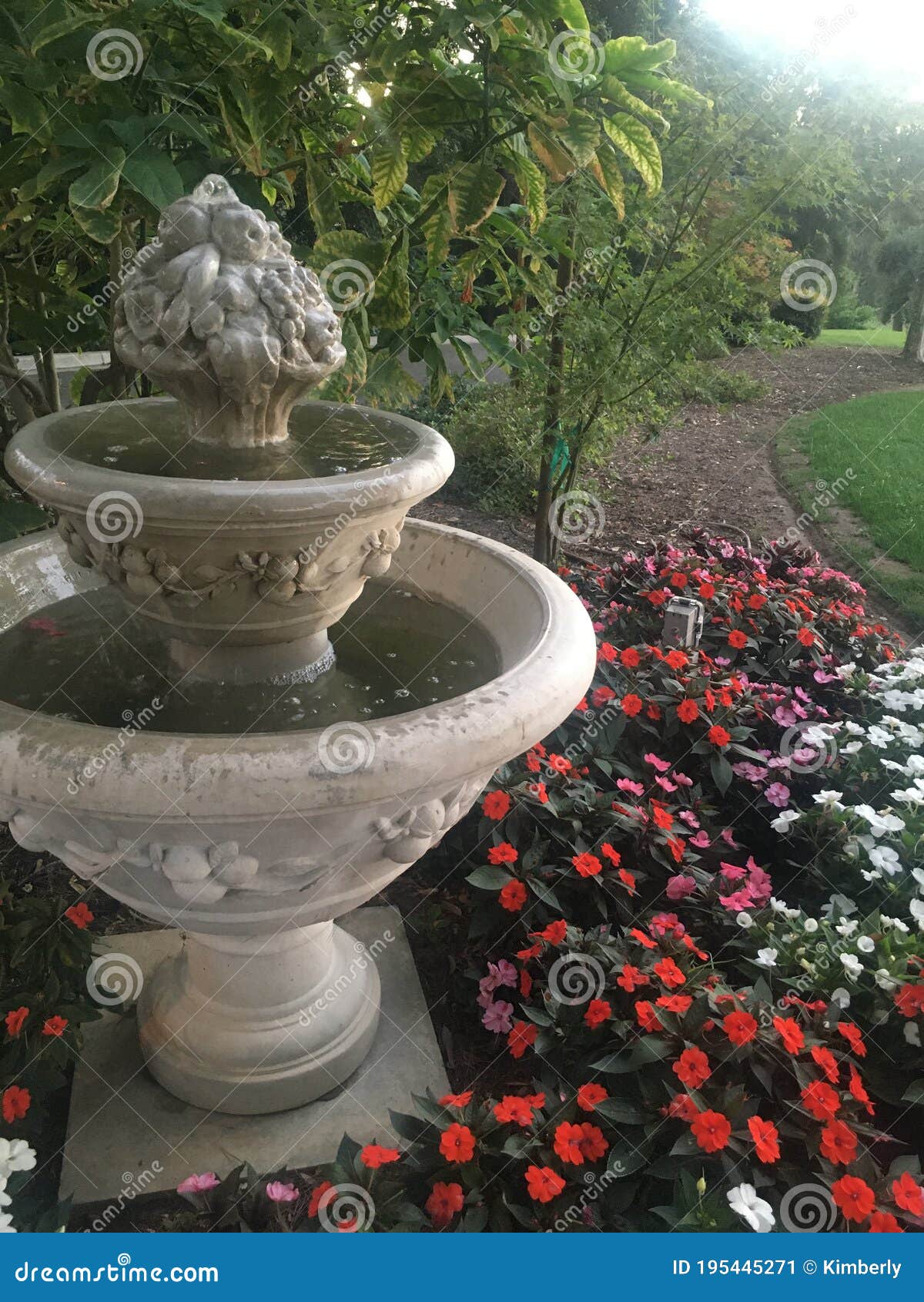 Lovely Fountain stock image. Image of flowers, nature - 195445271