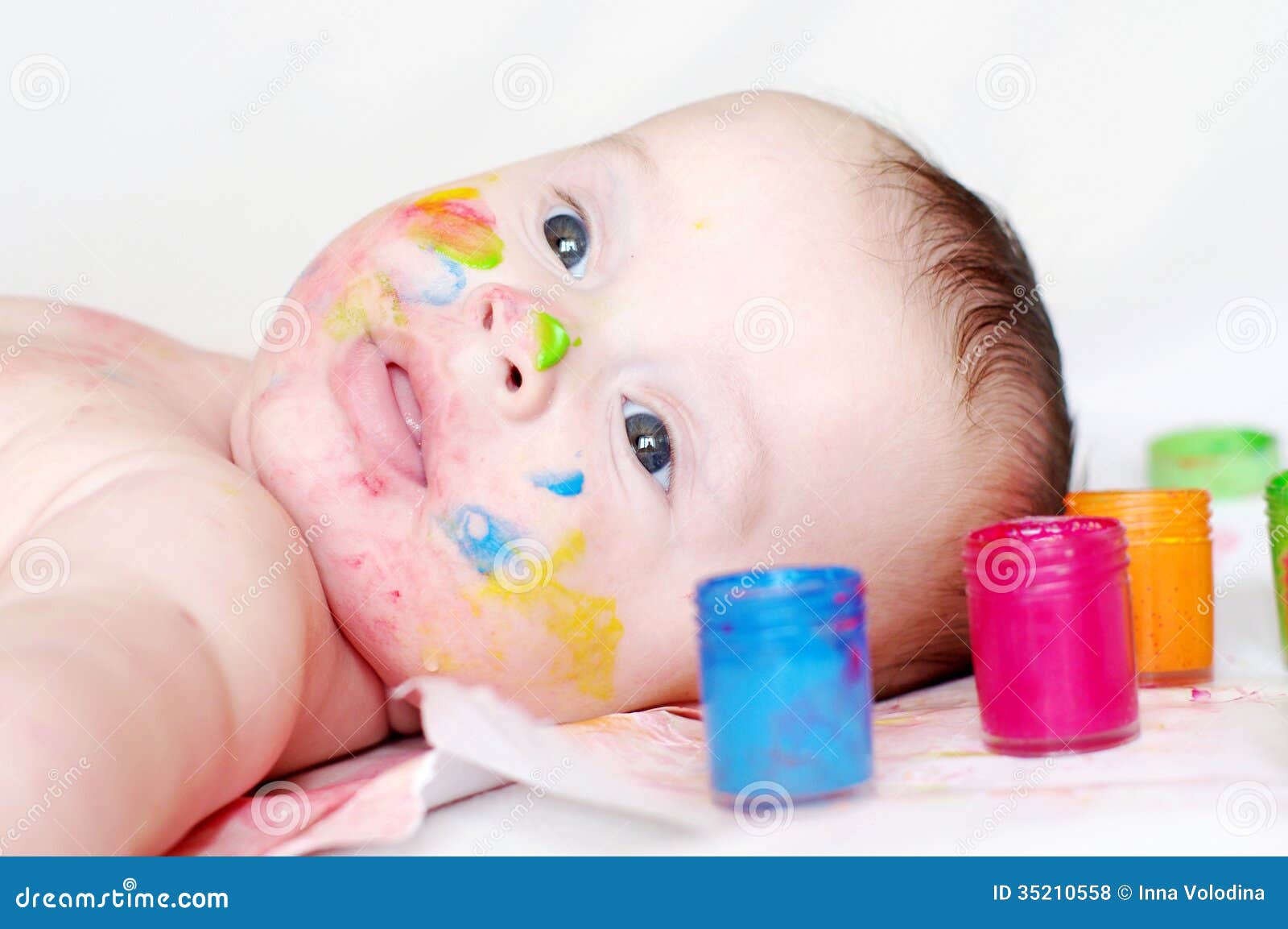 Lovely Four-months Baby with Multi-colored Paints Stock Photo - Image ...