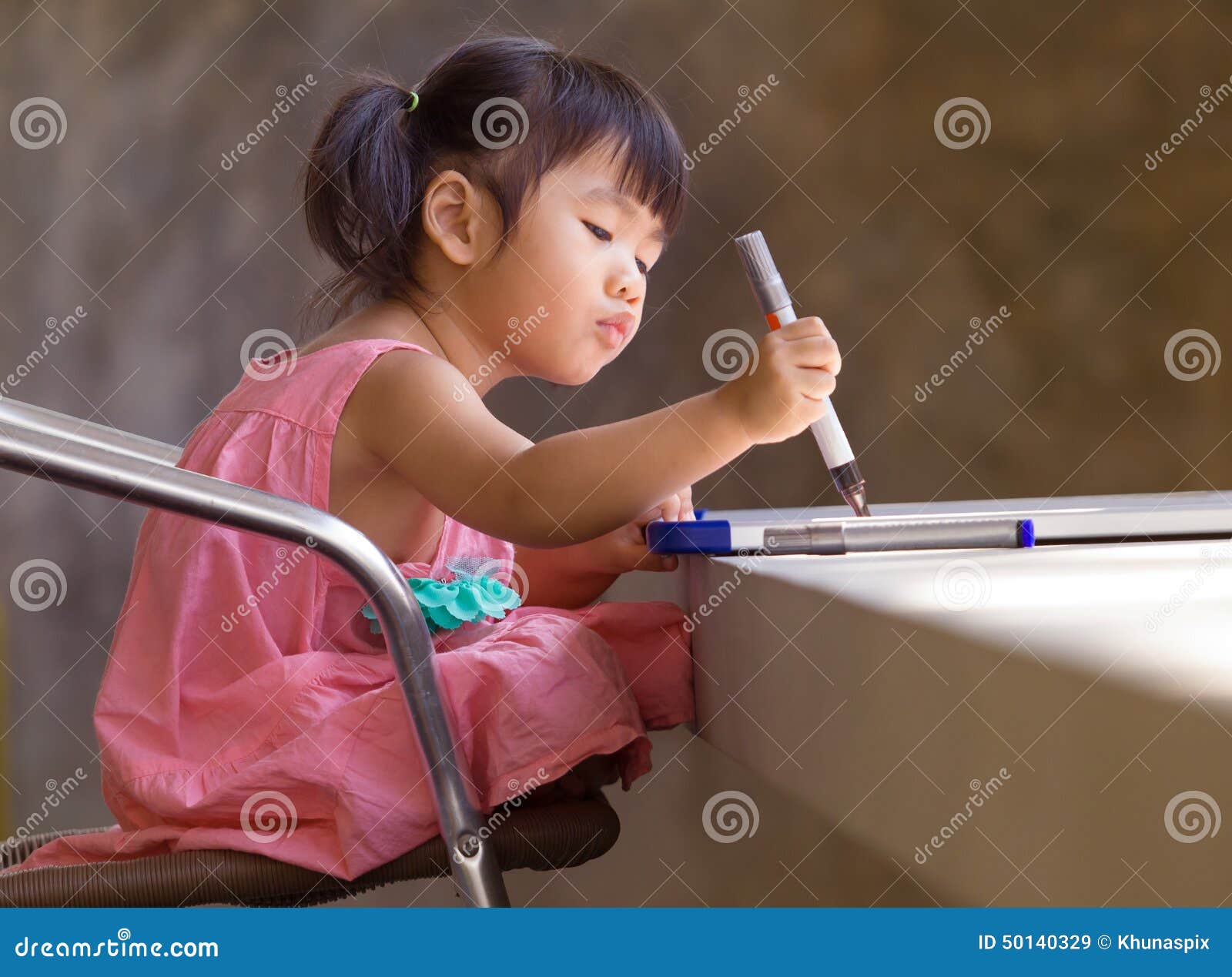 Lovely Kid Practice for Writing on White Broad before Class Lear Stock ...