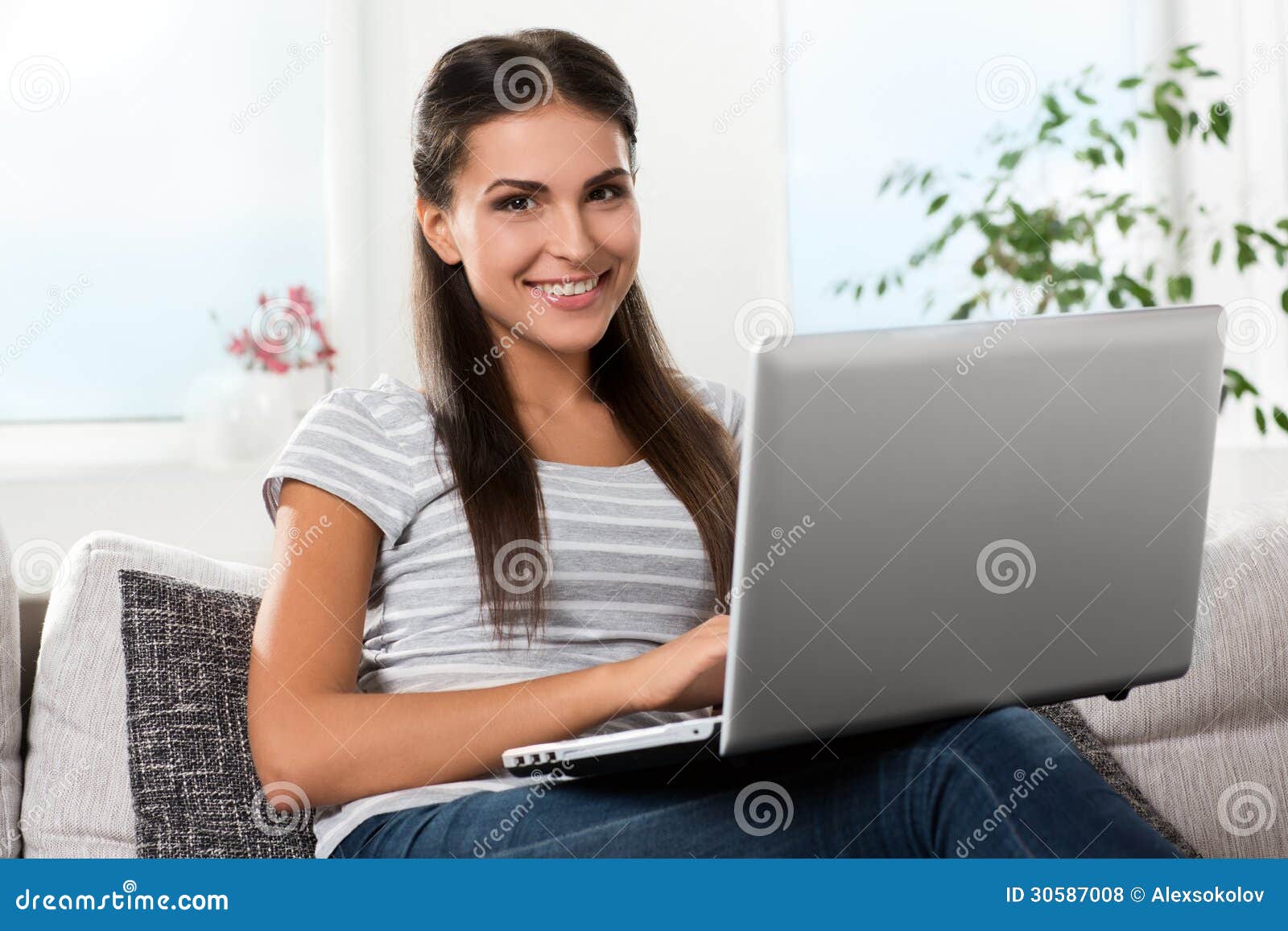 Lovely Lady Sitting on the Couch Using a Laptop Stock Photo - Image of ...