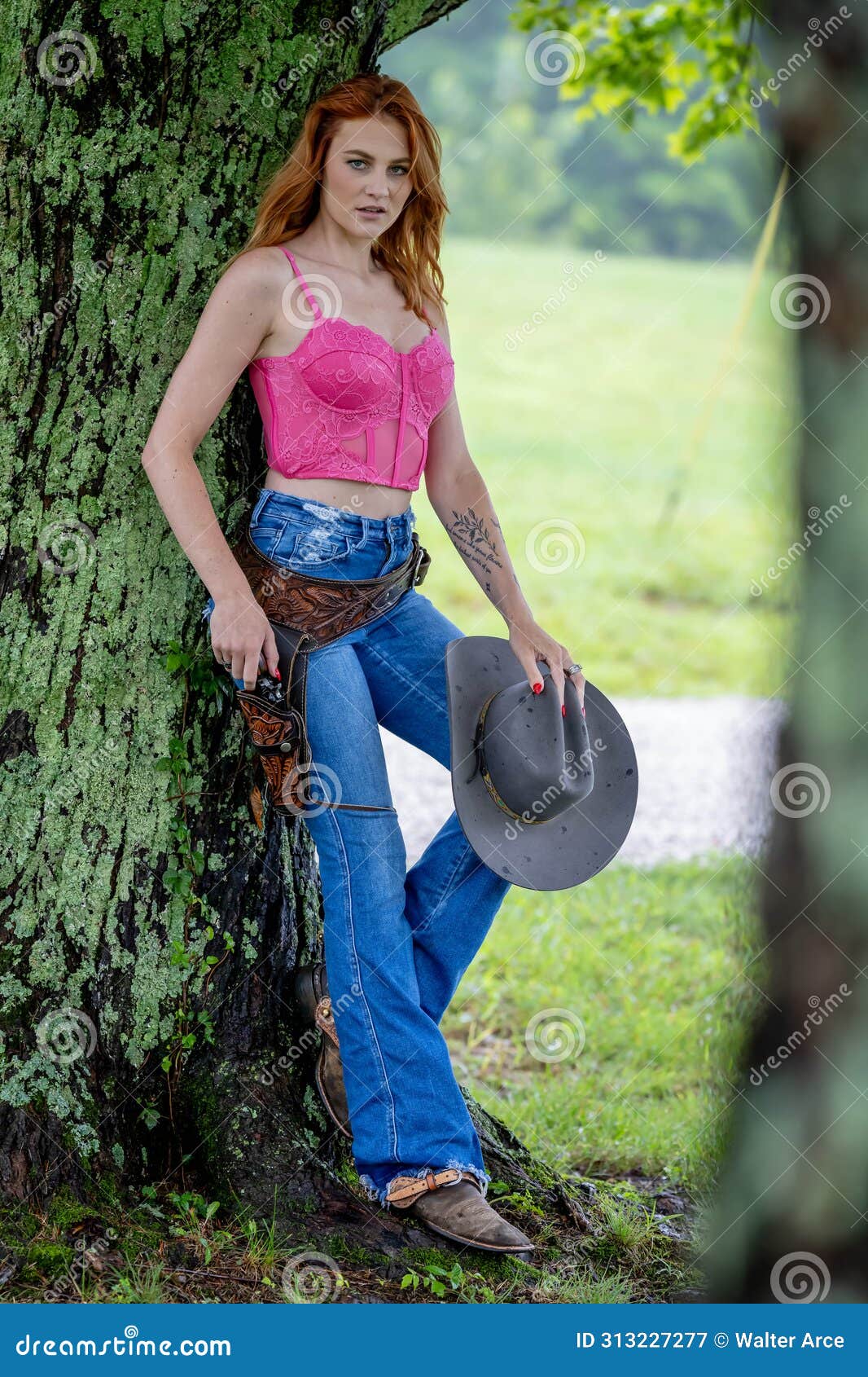 A Lovely Red Headed Country Wetern Model Poses Outdoors In A Country Setting Stock Image Image