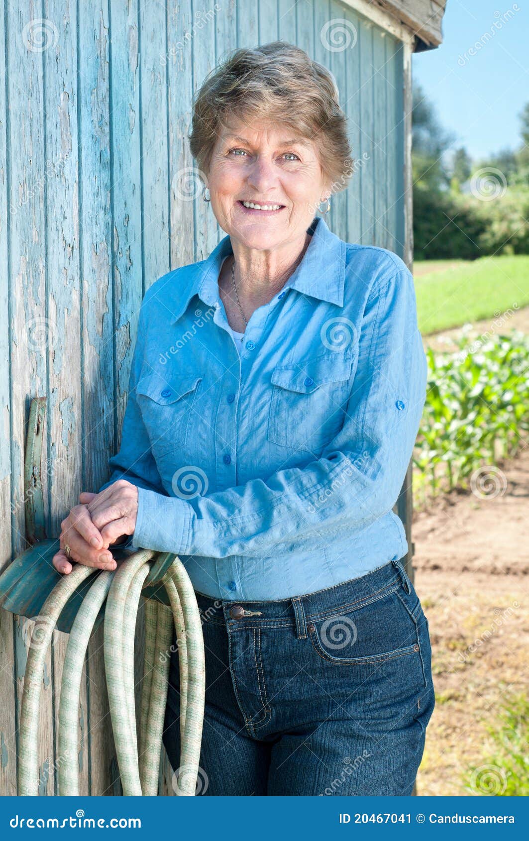 Lovely Senior Woman in Blue Stock Image - Image of happy, healthy: 20467041