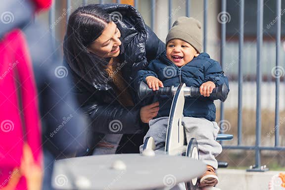 Lovely Shot of a Cute Little Boy with His Mom, Outdoors Stock Image ... Lovely Shot of a Cute Little Boy with His Mom, Outdoors Stock Image ...