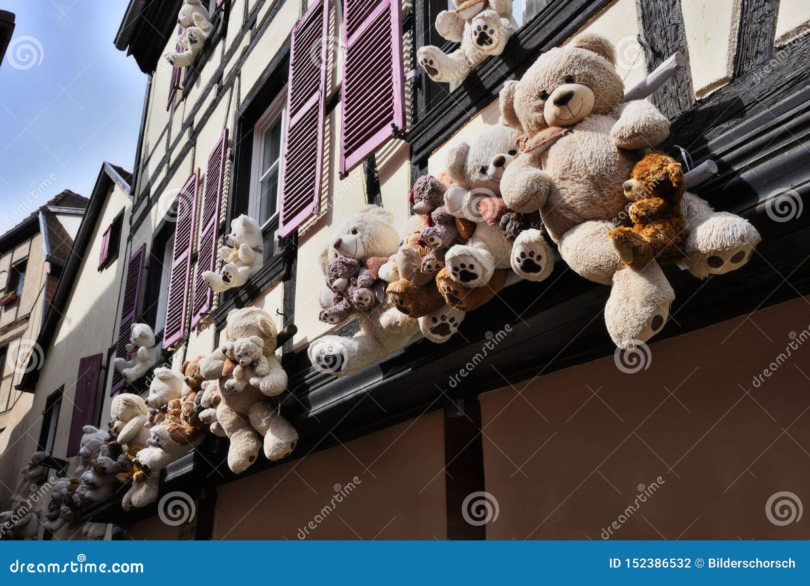 Lovely Teddy Bears Hanging at a Half-timbered House. Stock Photo ...