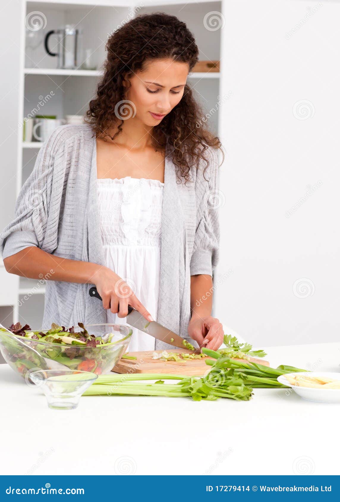 Lovely Woman Cutting Vegetables in the Kitchen Stock Photo - Image of ...