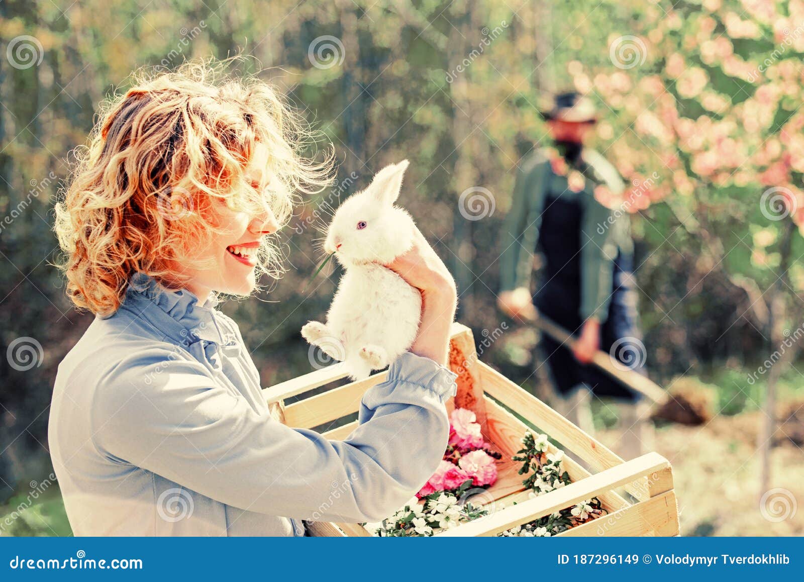 Lovely Woman Hold White Rabbit. Spring. Woman and Rabbit. Happy Easter ...