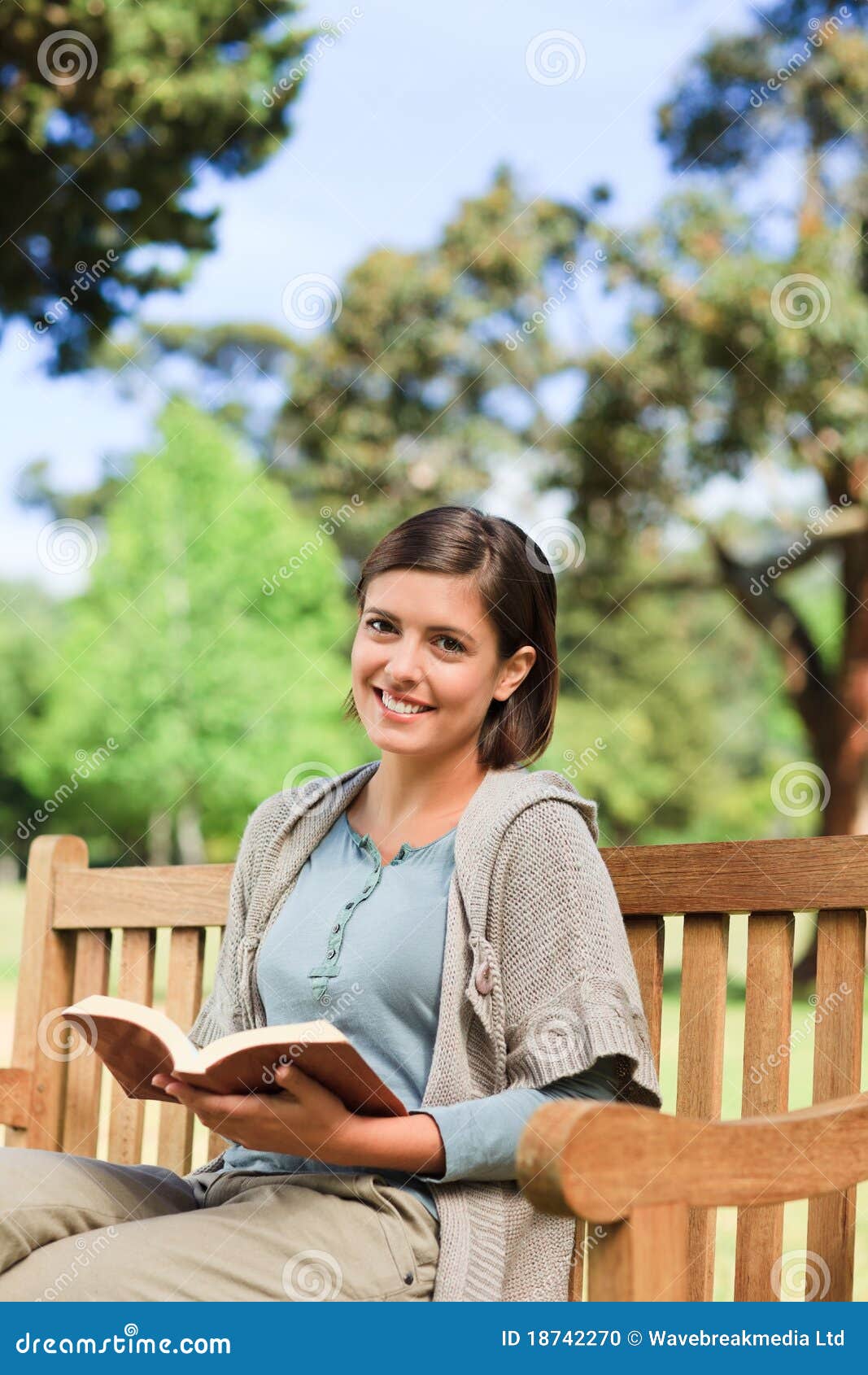 Lovely woman reading stock photo. Image of park, outside - 18742270