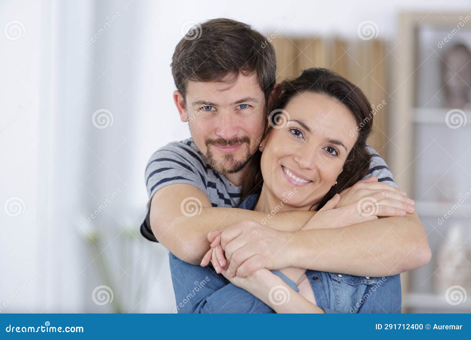Lovely Young Couple Cuddling at Home Stock Photo - Image of lovers ...