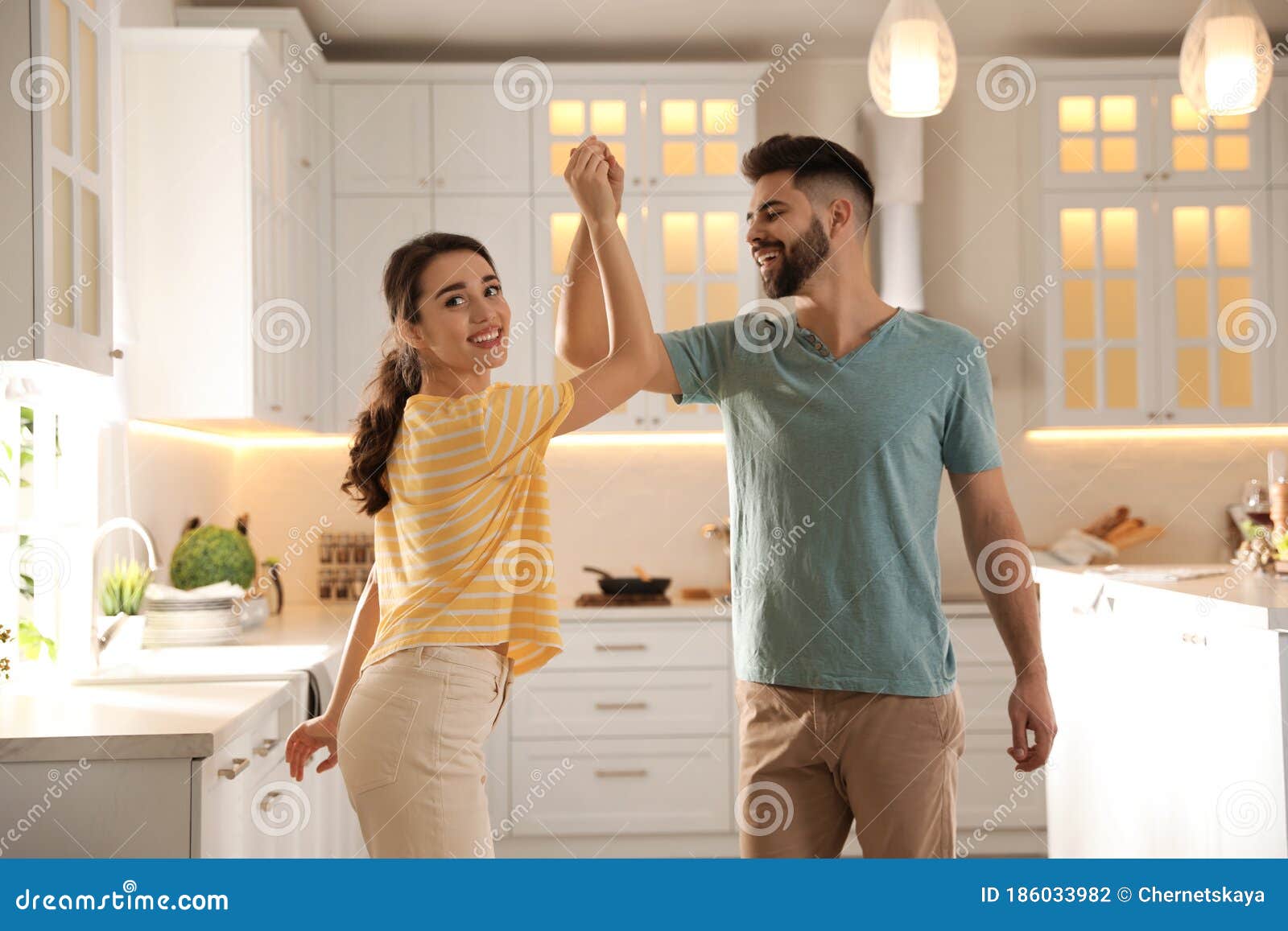 Lovely Couple Dancing in Kitchen. Cooking Together Stock Photo - Image ...