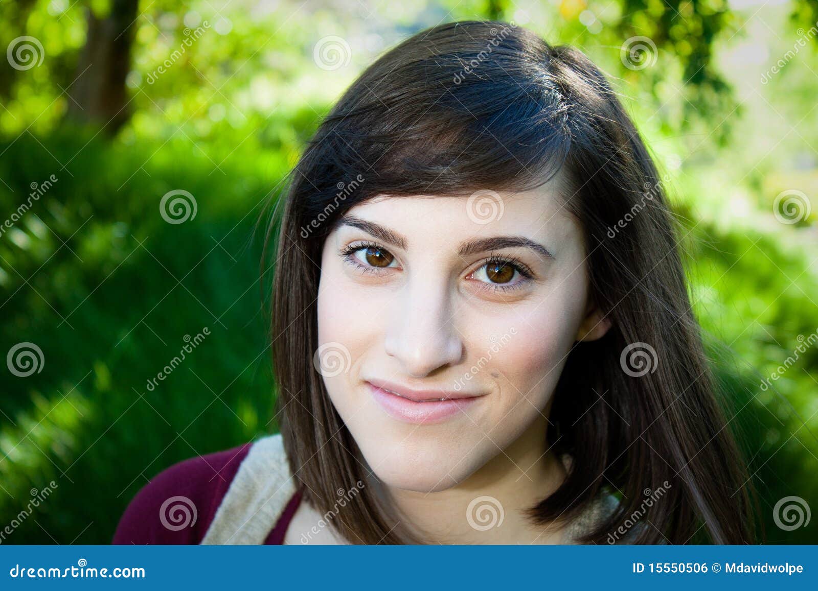 A Lovely Young Women Smiling into the Camera Stock Photo - Image of ...