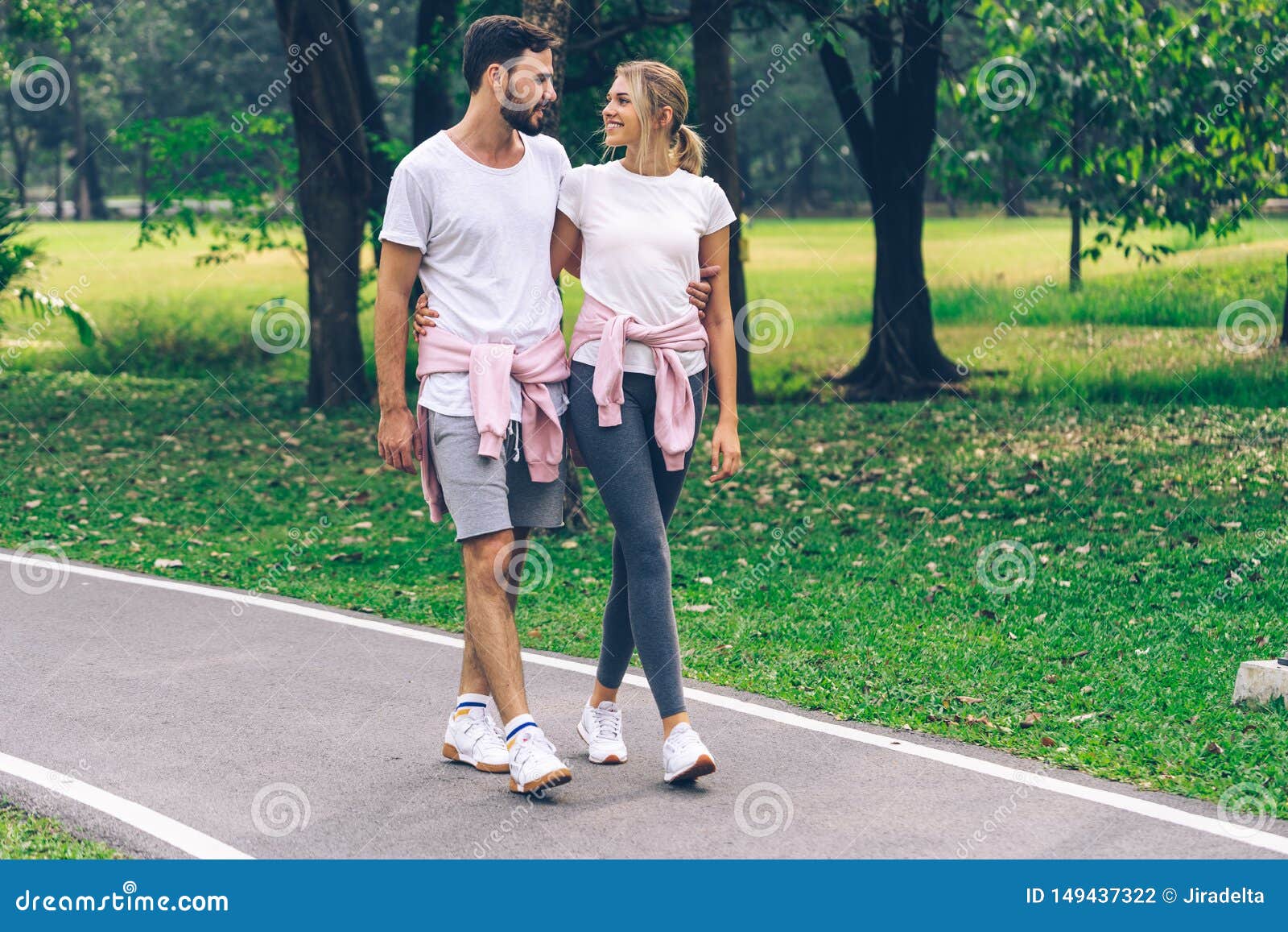 Lover Couple Holding Together and Walking in the Park Stock Photo ...