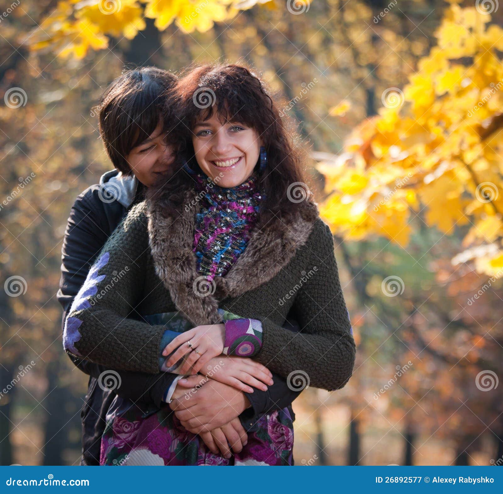 Lovers during autumn stock image. Image of park, romancelovers - 26892577
