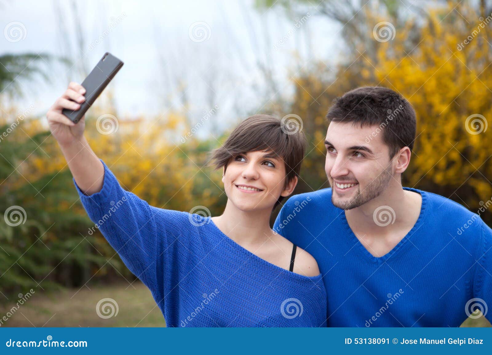 Lovers in the Park Taking Photo with Mobile Phone Stock Image - Image ...