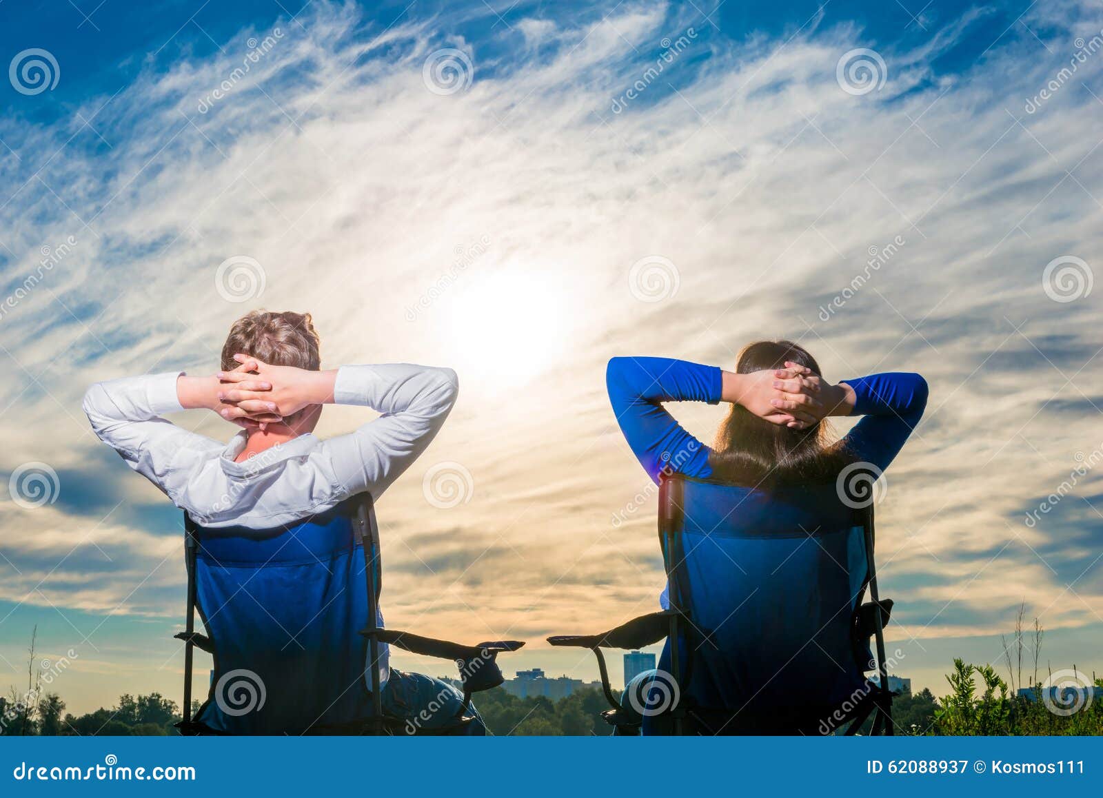 Lovers Sit on the Chairs and Look at the Beautiful Sky Stock Image ...
