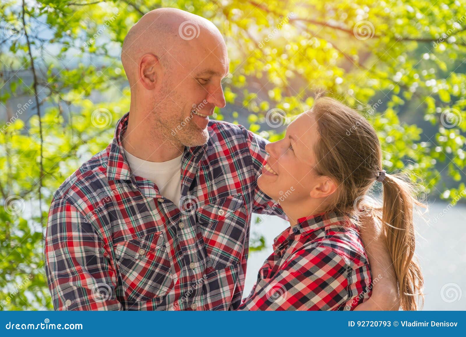 Lovers smile at each other stock image. Image of family - 92720793