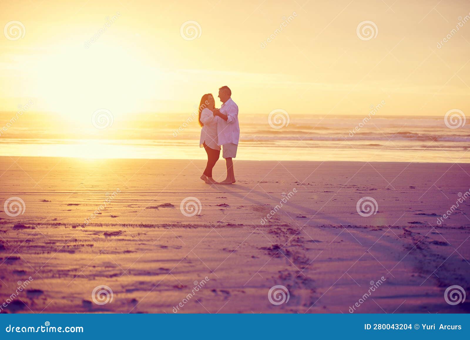 Lovers In The Sun Full Length Shot Of An Affectionate Mature Couple