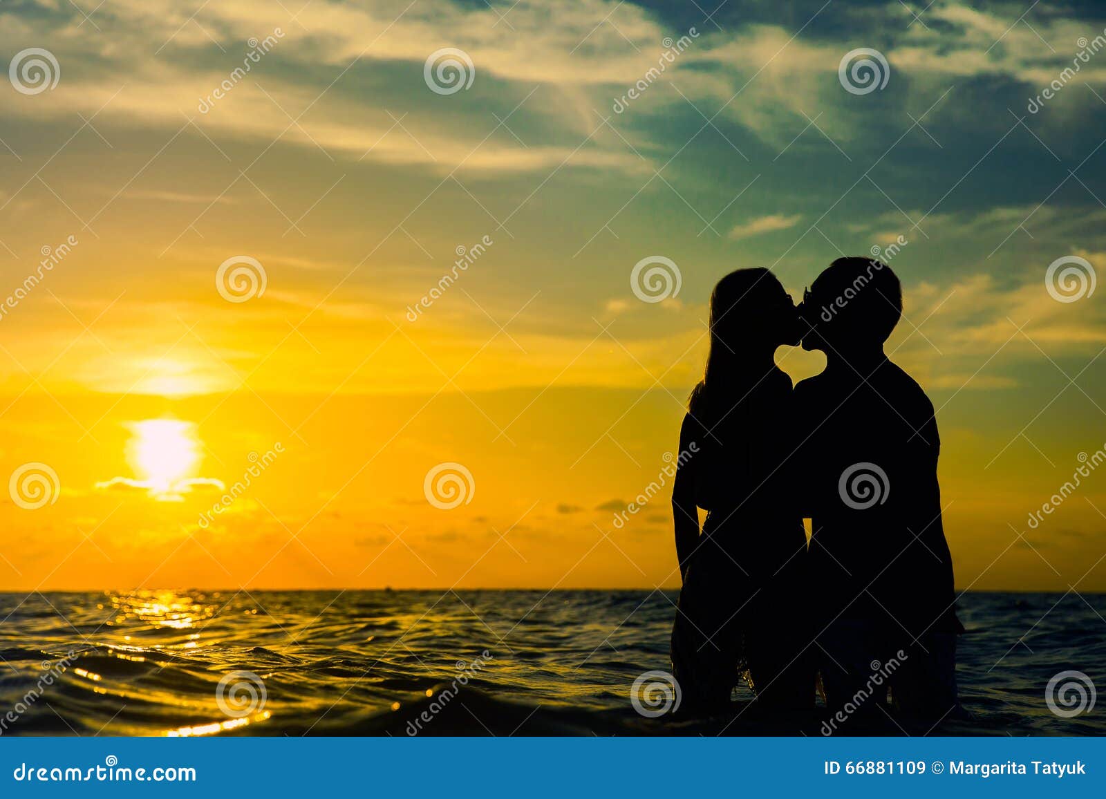 Lovers at sunset stock image. Image of beautiful, romantic - 66881109